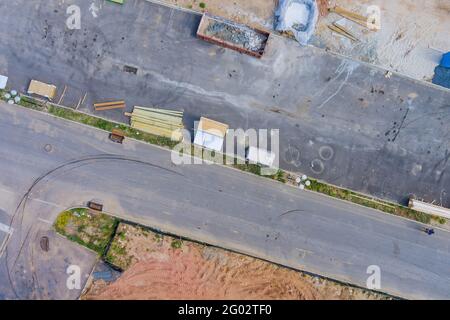 Aerial view of storage place. Construction materials in industrial city ...