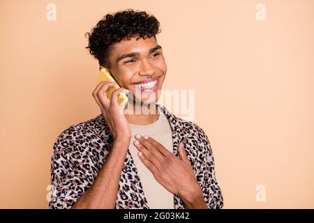 Photo of brunet optimistic guy listen boom box wear modern shirt ...