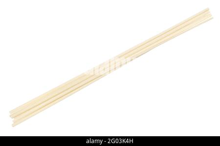 bunch of dried round Udon noodles from wheat flour isolated on white ...