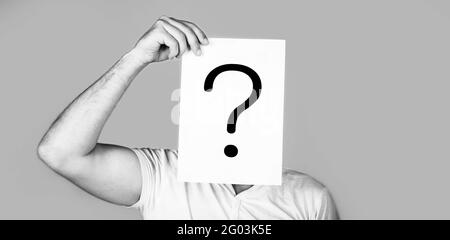 Anonymous man, peeking behind of interrogation symbol. Male incognita ...