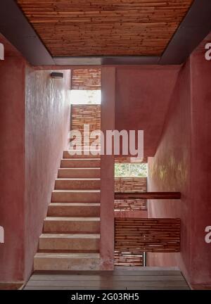 Public corridor and stairs. Tulum Apartments, Tulum, Mexico. Architect ...