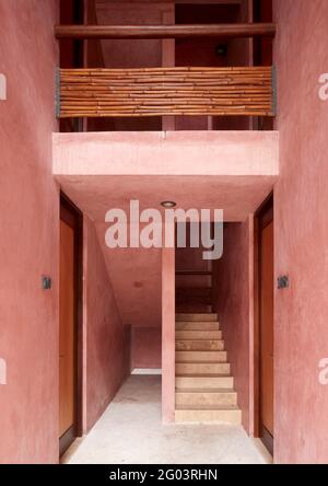 Public Corridor and stairs. Tulum Apartments, Tulum, Mexico. Architect ...