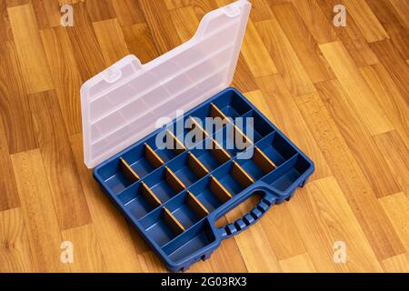 Plastic cells in the small change box close up Stock Photo - Alamy