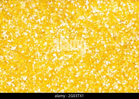 food background - uncooked coarse maize cornmeal Stock Photo - Alamy