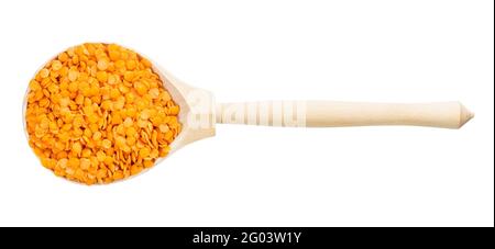 top view of wood spoon with split red lentils isolated on white ...