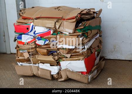 Compacted cardboard waste for recycling industry Stock Photo - Alamy