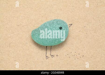 stylish textured craft paper background funny little bird made of a ...