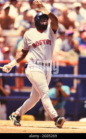 Mo Vaughn of the Boston Red Sox, right, is congratulated by Reggie ...