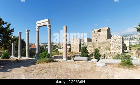 Roman columns and Byblos citadel, Crusader castle, Jbeil, Lebanon Stock ...