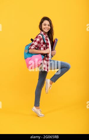 back to school. tween hurry up. childhood happiness. happy girl in ...