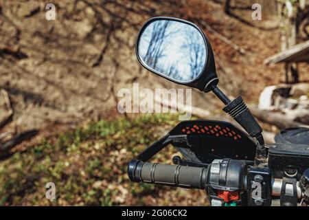 Handlebar of four-wheeled ATV quad bike close up Stock Photo - Alamy