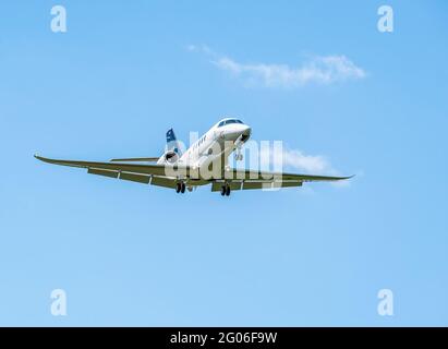 A Cessna 680 Latitude business jet taxiing on the ramp after landing ...