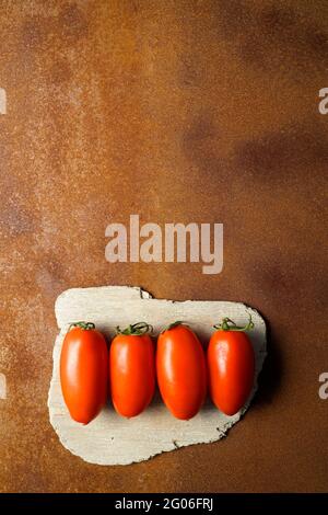 Typical tomato called perino from organic cultivation grown in southern ...