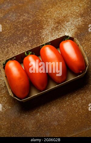 Typical tomato called perino from organic cultivation grown in southern ...