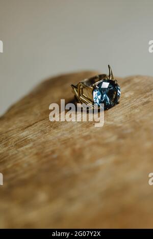 Side view of gem ring detail. A ring in a modern avant-garde style ...