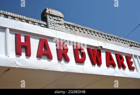 Historic Buildings in Rural Small Town Hardware Sign Stock Photo - Alamy