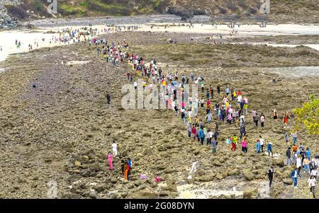 Pilgrims walk across island to temple to worship goddess for peace ...
