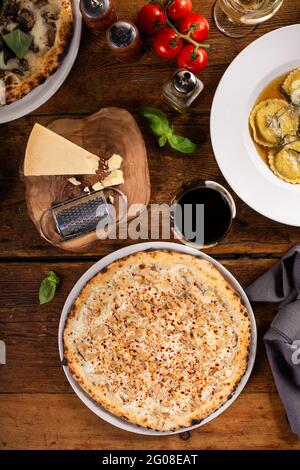 White cheese neapolitan style pizza with artichokes Stock Photo - Alamy