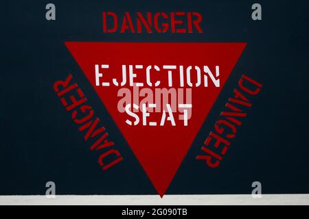 Danger aircraft jet ejector seat rescue and intake signs on side of ...