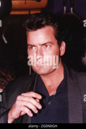 London. UK. LIBRARY. Early 1990s; Sally Farmiloe and Jeffrey Archer at ...