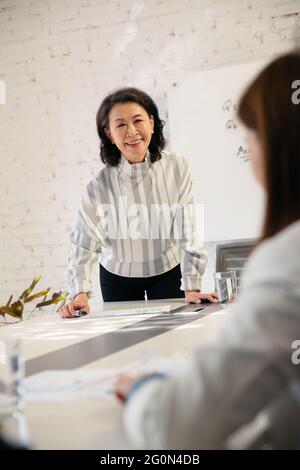 Business elderly ladies preside over the meeting Stock Photo - Alamy