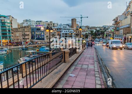 SAN GILJAN, MALTA - NOVEMBER 11, 2017: Boats on Spinola Bay in Malta ...