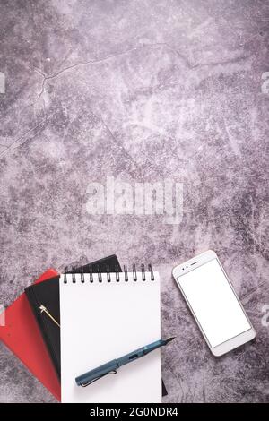 Different notebooks and pen on white background Stock Photo - Alamy