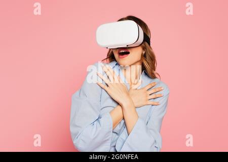 Isolated shoot of young woman gaming with VR weapon, speacial mask on ...