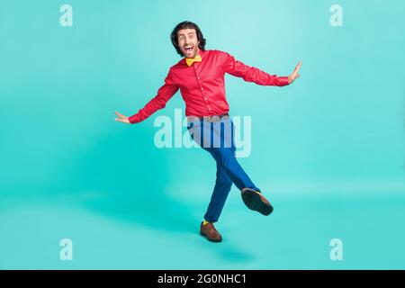 Full length photo of funky brunette young lady dance wear striped dress ...