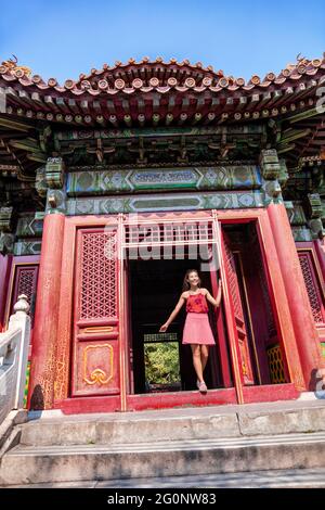 woman visiting the old chinese house. with old furniture and decoration ...