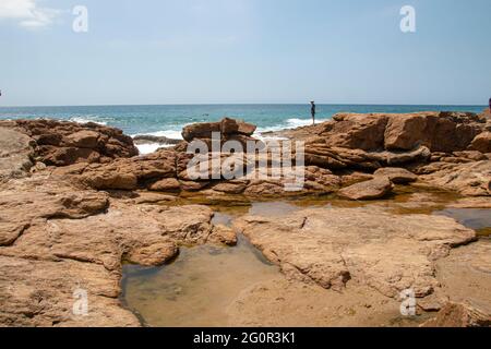 Rock pools at the beach with sea beyond Stock Photo - Alamy