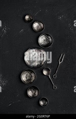 Empty black round metal plate with non-stick coating isolated on white ...