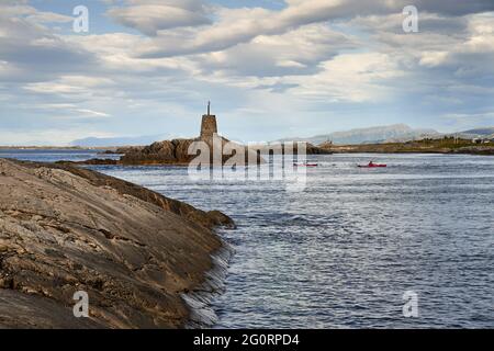 VEVANG, NORWAY - Jul 28, 2020: A family is enjoying a boat trip between ...