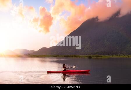 Adventure Caucasian Adult Woman Kayaking in Red Kayak Stock Photo - Alamy