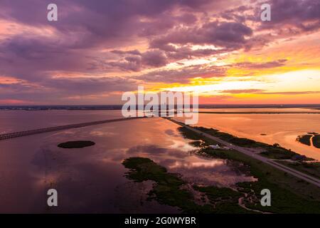 Mobile Bay Causeway at sunset Stock Photo - Alamy