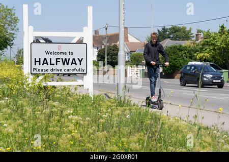 Country border sign for Halfway erected on road side, Kent, England ...
