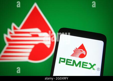 In this photo illustration, the Pemex logo is seen displayed on a ...