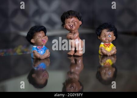 Closeup face of smiling doll on table top, hope, happy concept, good ...