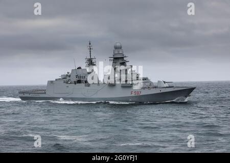 The Italian Navy frigate ITS Carlo Bergamini (F590), being aided by the ...