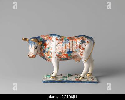 Faïence cow. Faïence cow, painted multily with flowers Stock Photo - Alamy