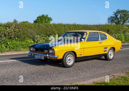 1971 70s seventies Daytona Yellow Ford Capri 1599cc coupe; travelling ...