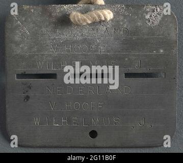 Identity plate by Wim van Hooff, prisoner of war in Stalag IVB in ...