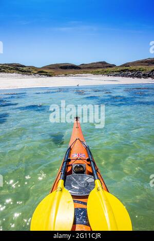 The view from a sea kayak whilst kayaking in the Summer Isles, North ...