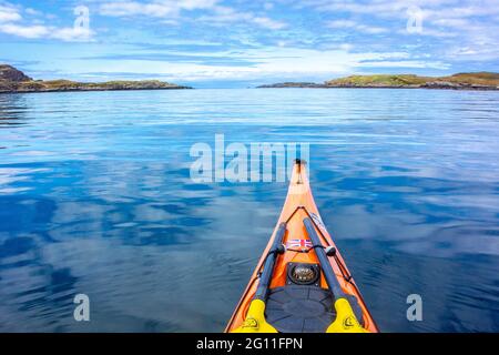 The view from a sea kayak whilst kayaking in the Summer Isles, North ...