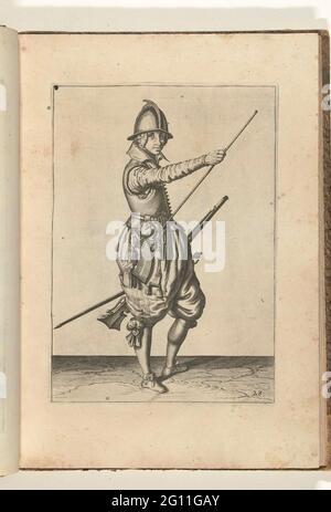 Soldier shifting his loading stick in the holder under the course of ...