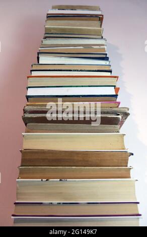 One on top of the other, a pile of stacked old dilapidated books Stock ...