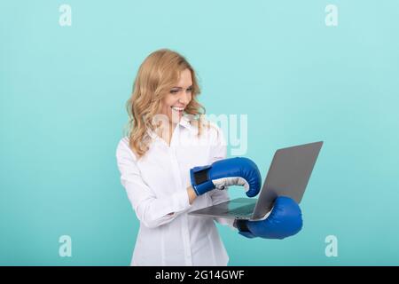 ceo watching championship. woman boss punch laptop in boxing gloves ...