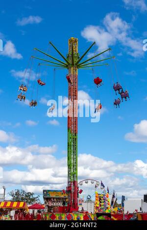 carnival swing ride Stock Photo - Alamy