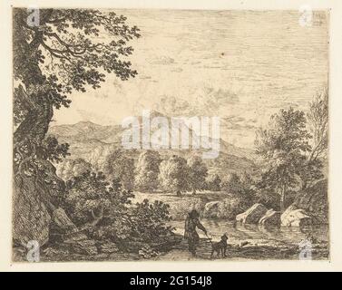 Hilland landscape with man and dog Stock Photo - Alamy