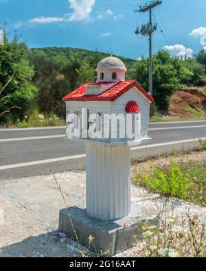 Kandylakia - typical greek miniature roadside shrine Stock Photo - Alamy